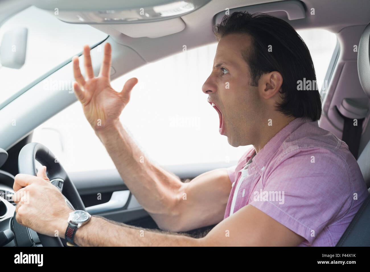 Man having road rage Stock Photo - Alamy