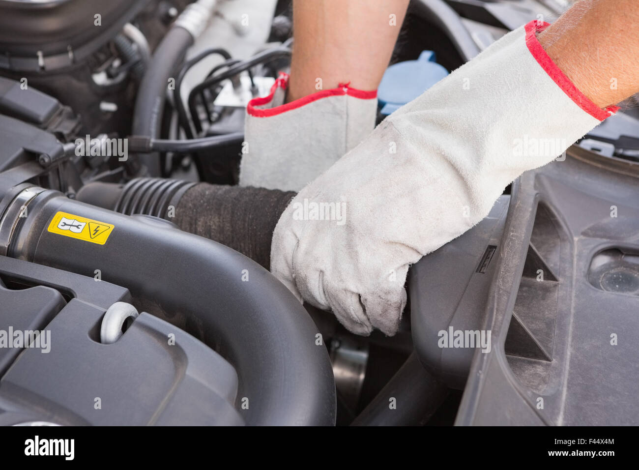 Close up of engine in bonnet Stock Photo - Alamy
