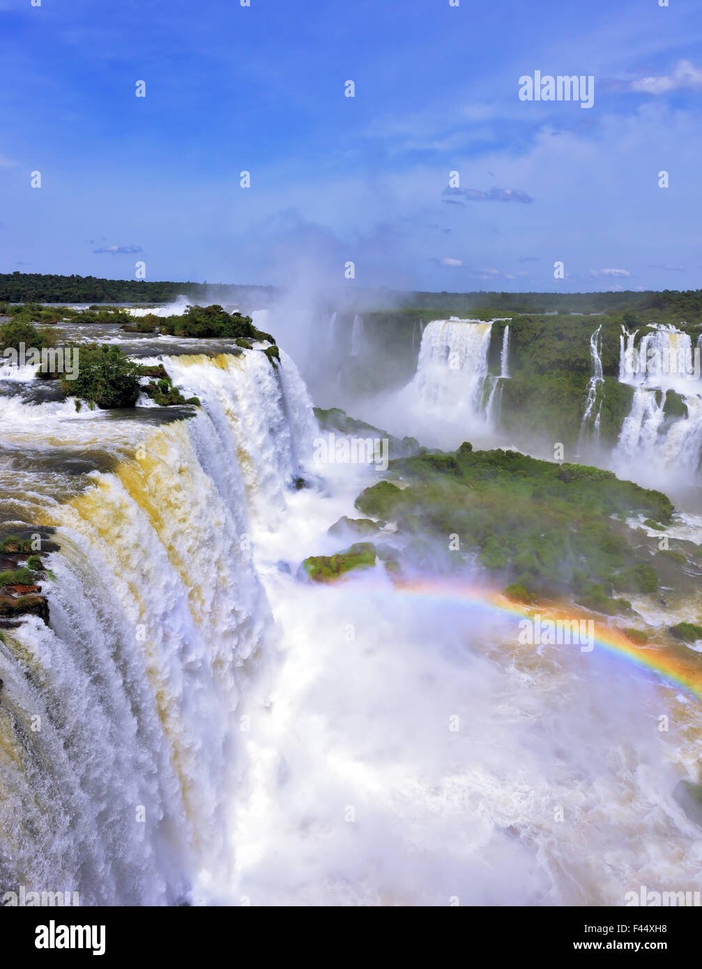 Magnificent rainbow shines in the mist Stock Photo - Alamy
