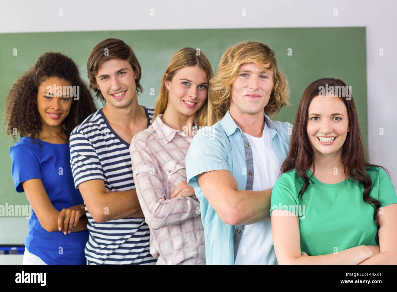 College students arms crossed Stock Photo - Alamy
