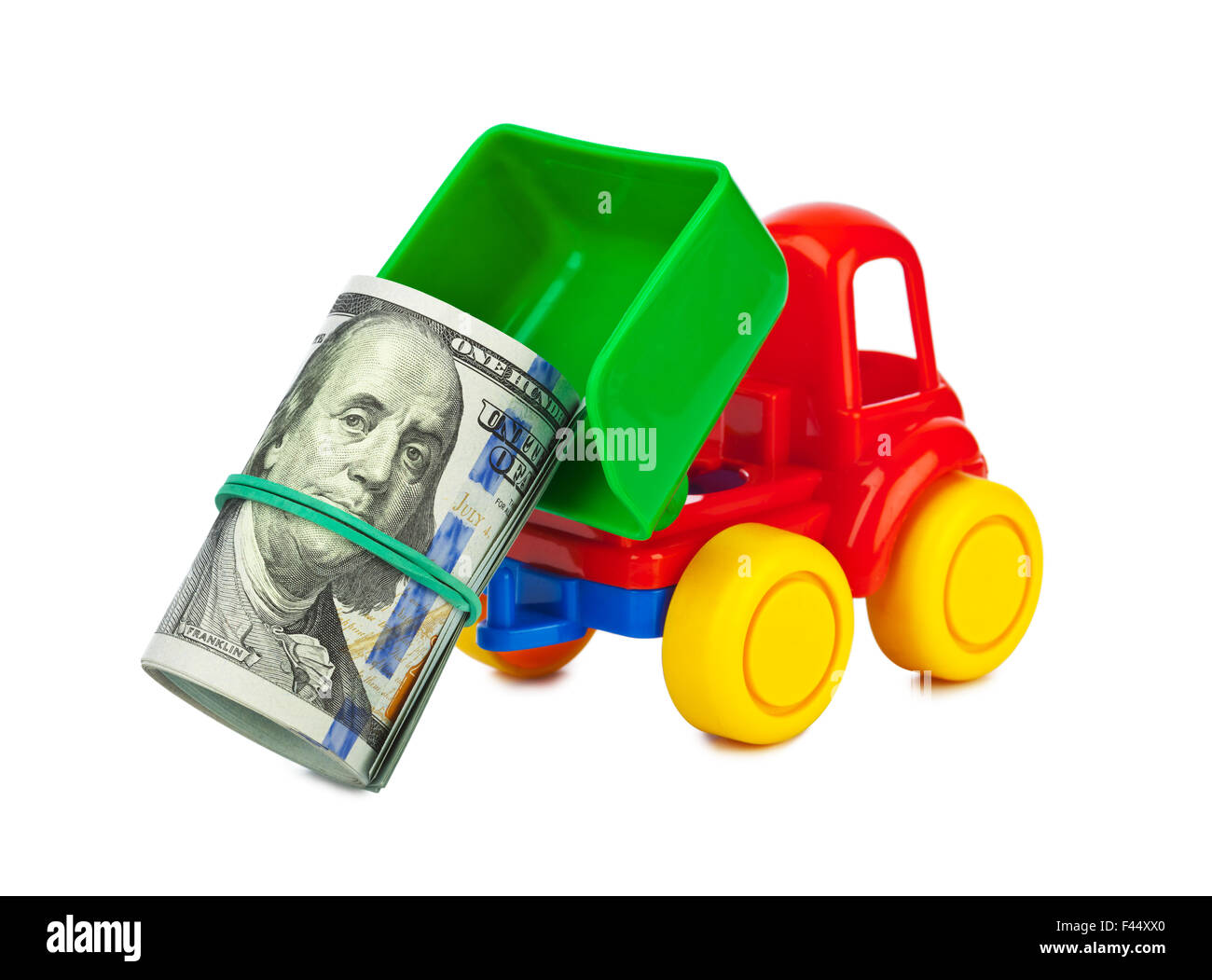 Toy truck with money Stock Photo - Alamy