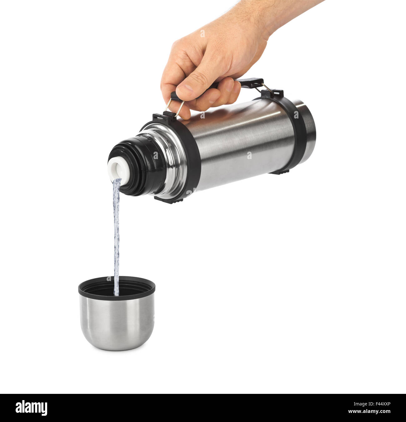 Hand and thermos flask Stock Photo - Alamy