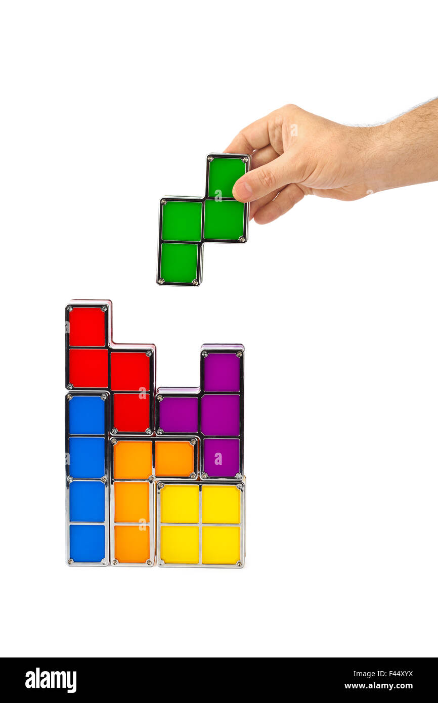 Hand with tetris toy blocks Stock Photo - Alamy
