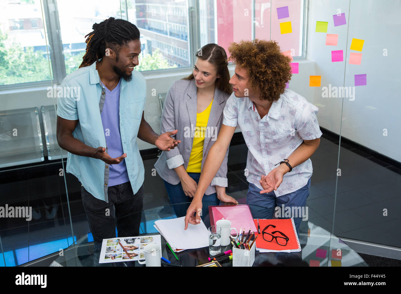 Creative business people working at desk Stock Photo - Alamy