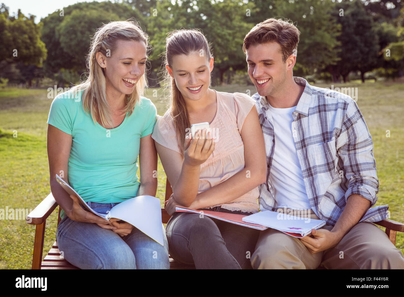 Students studying outside on campus Stock Photo - Alamy