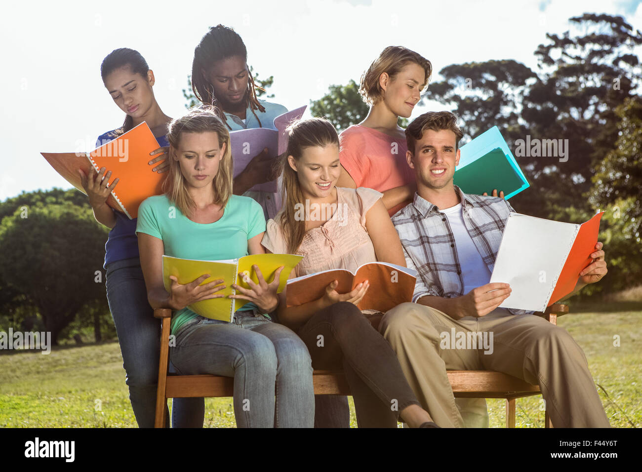 Students studying outside on campus Stock Photo - Alamy
