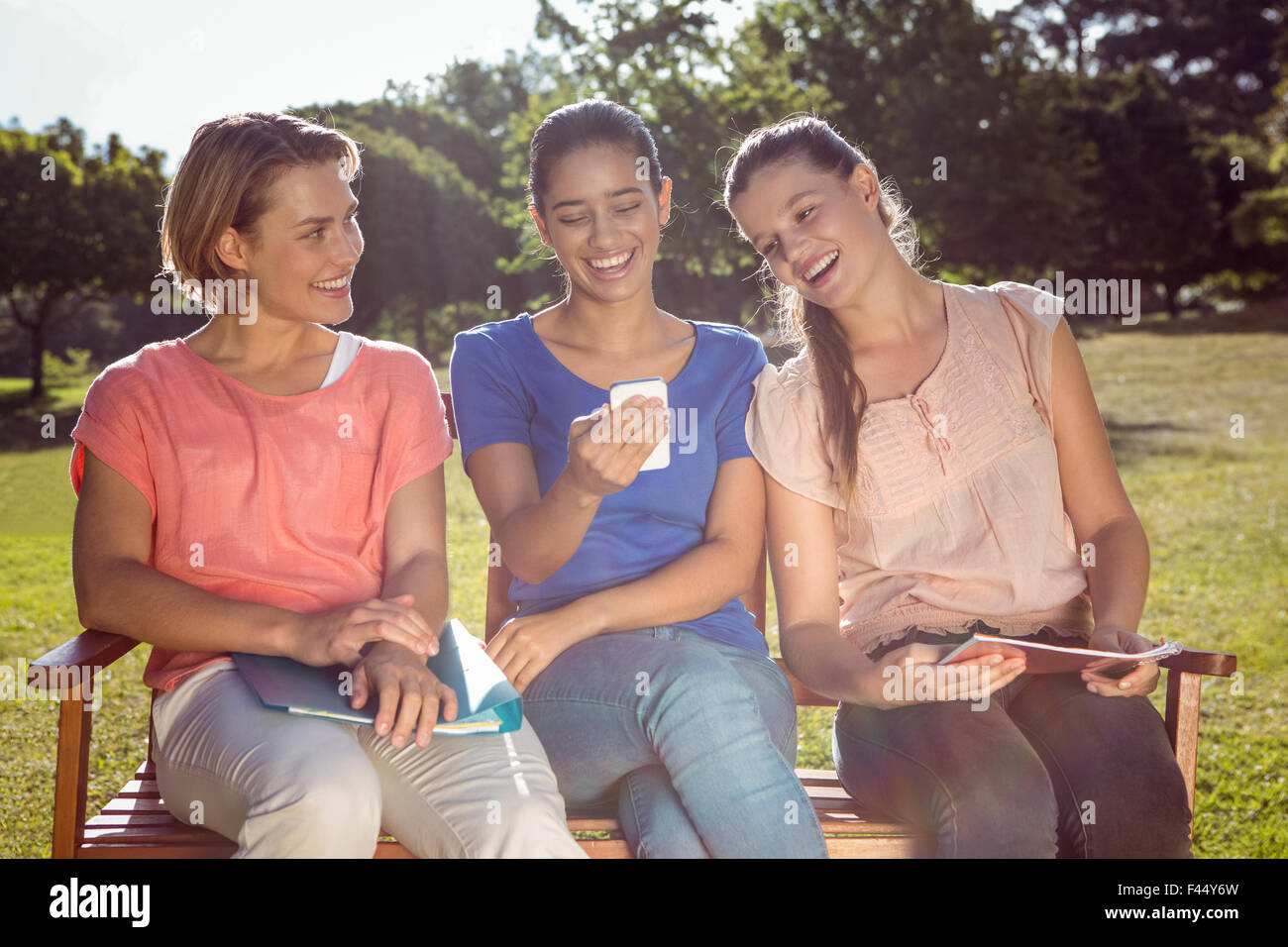 Students studying outside on campus Stock Photo - Alamy
