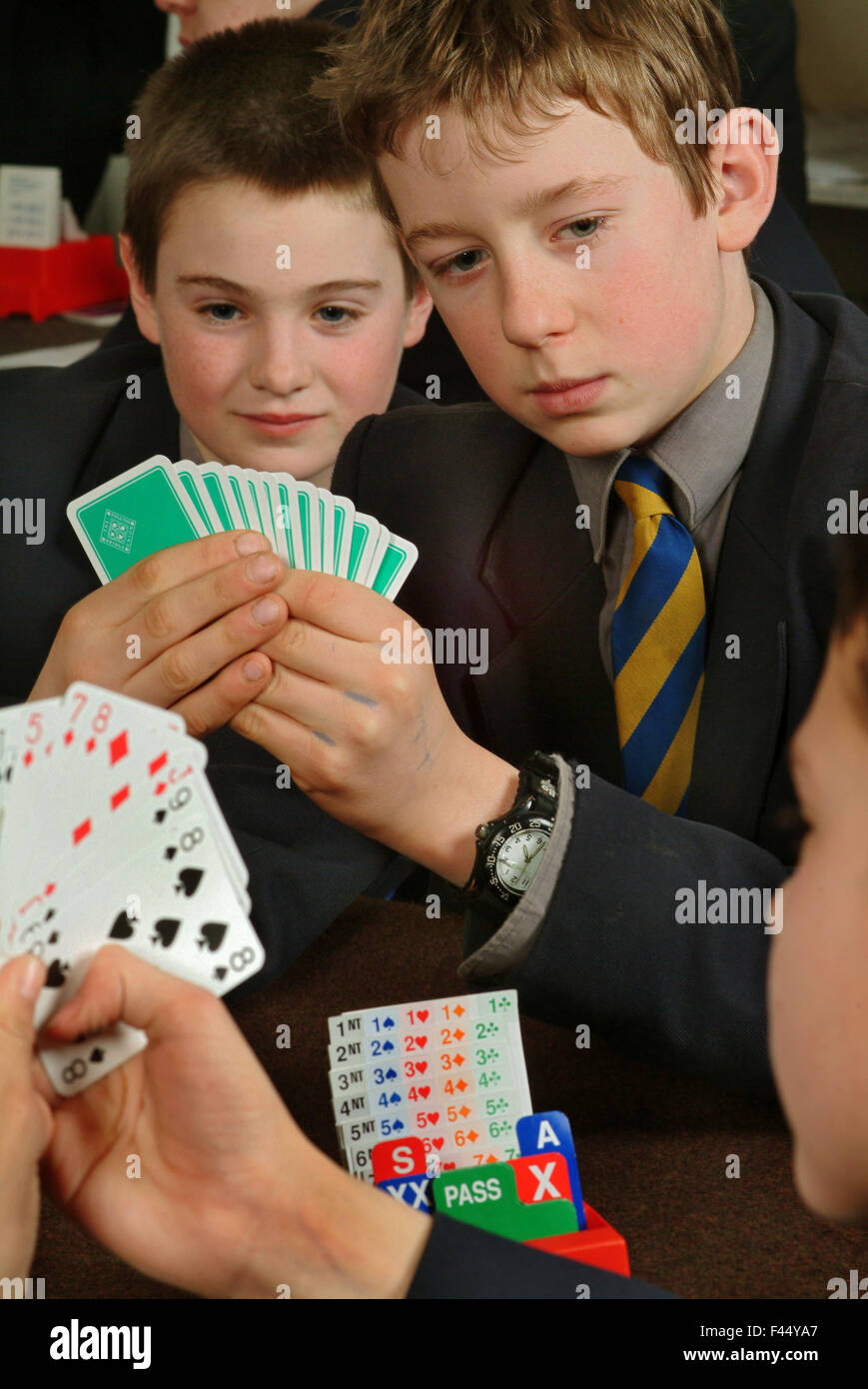 Children playing cards in school hi-res stock photography and images ...