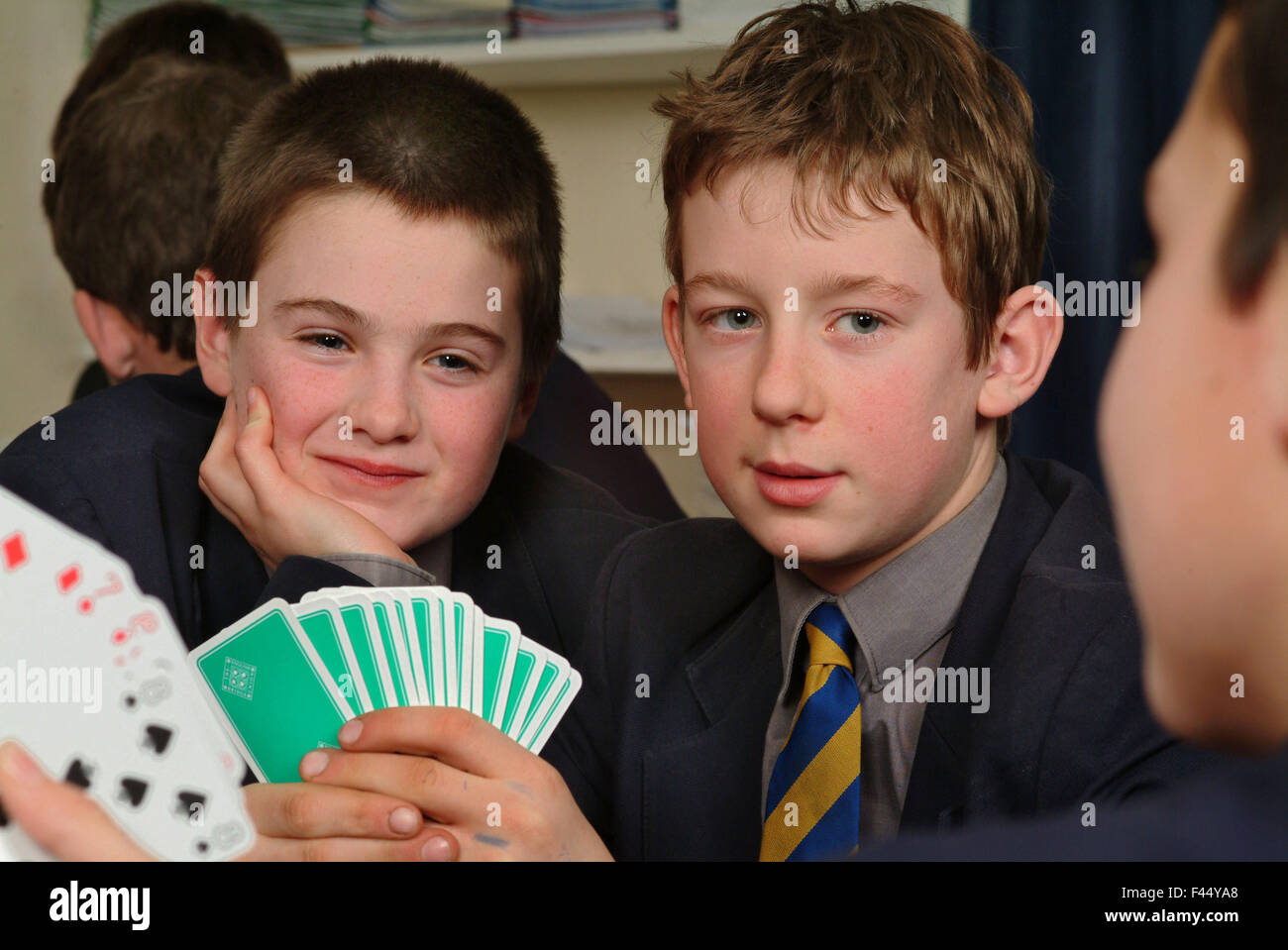 Children playing cards uk hi-res stock photography and images - Alamy
