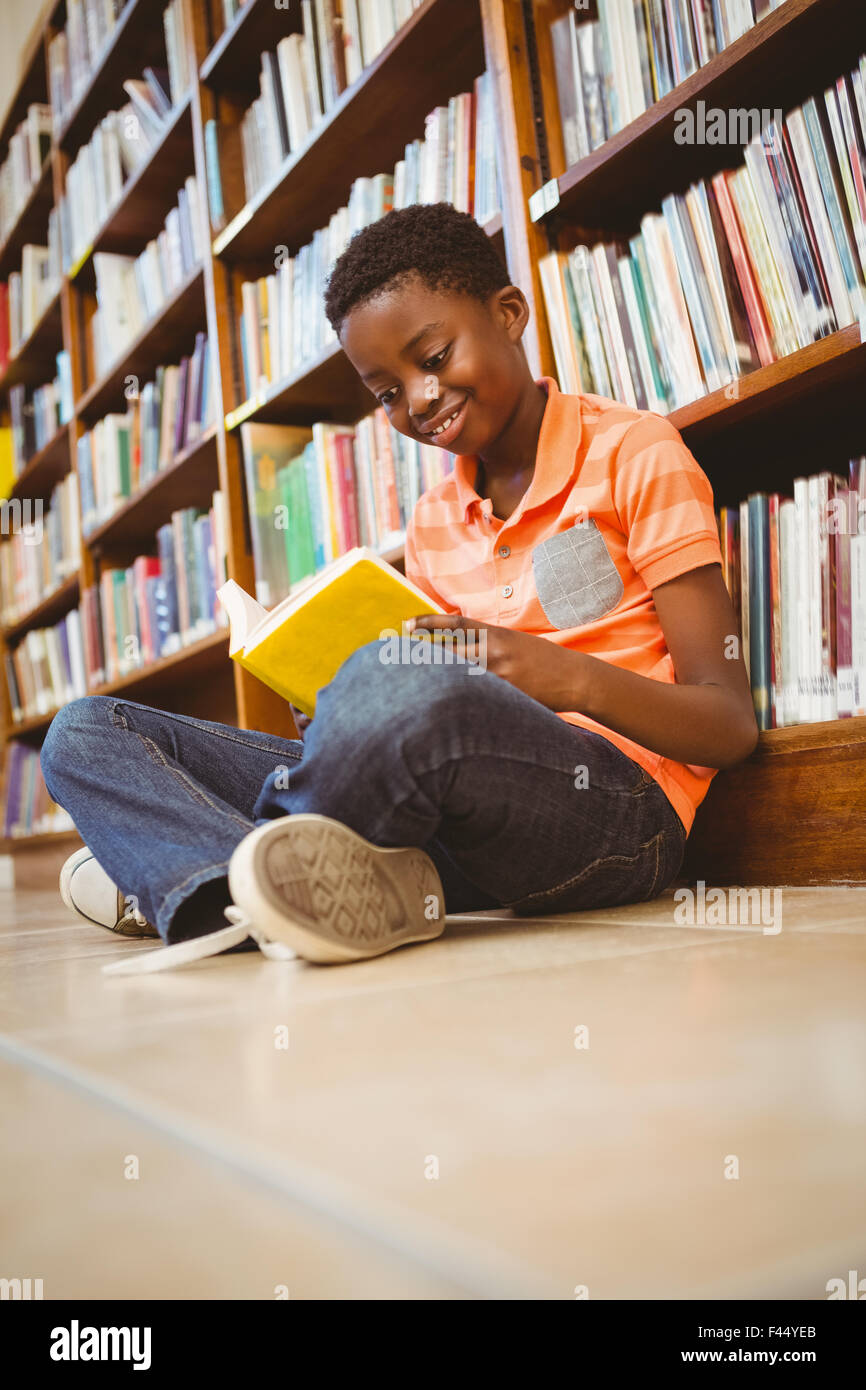 Black child reading book library hi-res stock photography and images ...
