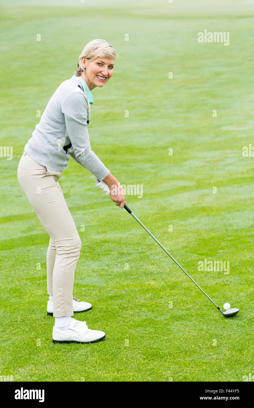 Lady golfer on putting green hi-res stock photography and images - Alamy