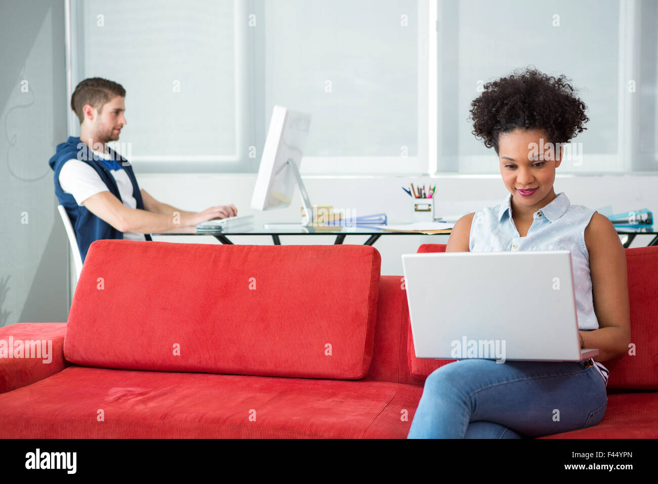 Creative team using computers Stock Photo - Alamy