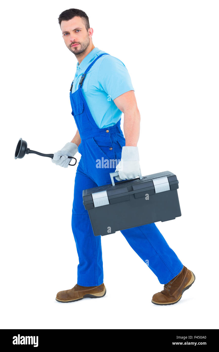 Plumber with plunger and toolbox Stock Photo - Alamy