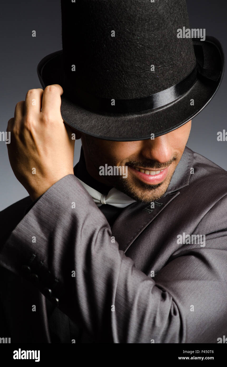 Man with hat in vintage concept Stock Photo - Alamy