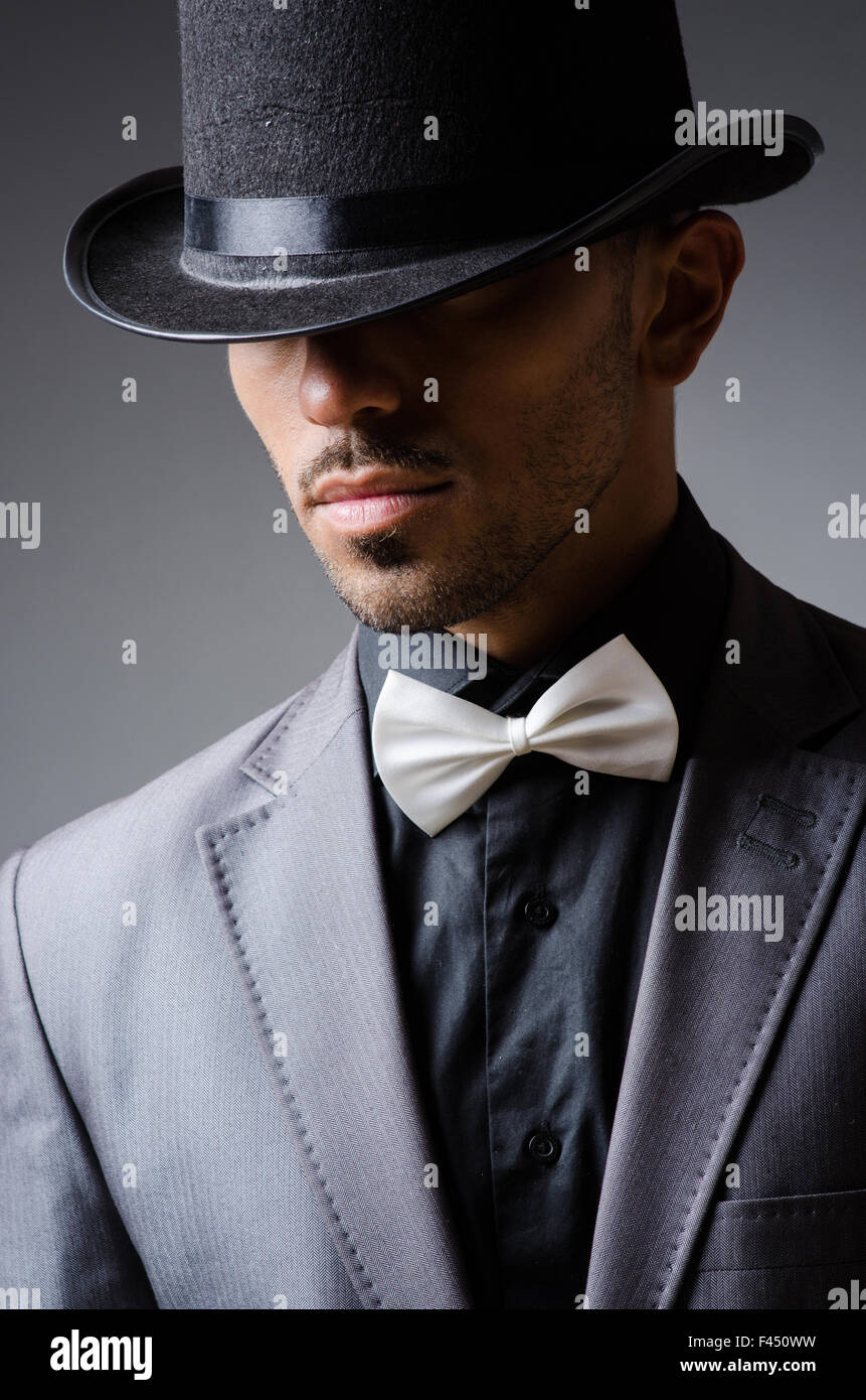Man with hat in vintage concept Stock Photo - Alamy