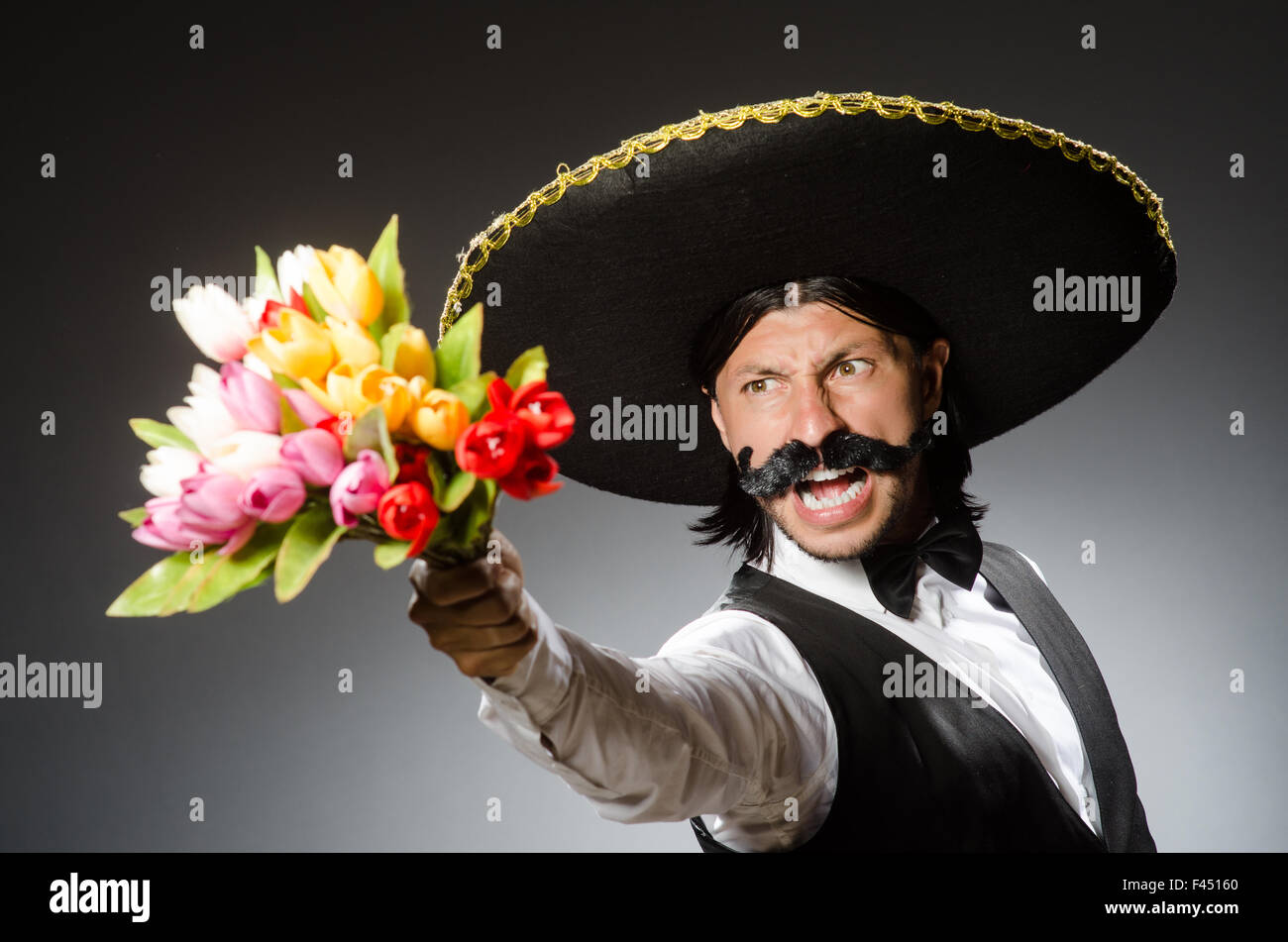 Mexican man wears sombrero isolated on white Stock Photo - Alamy