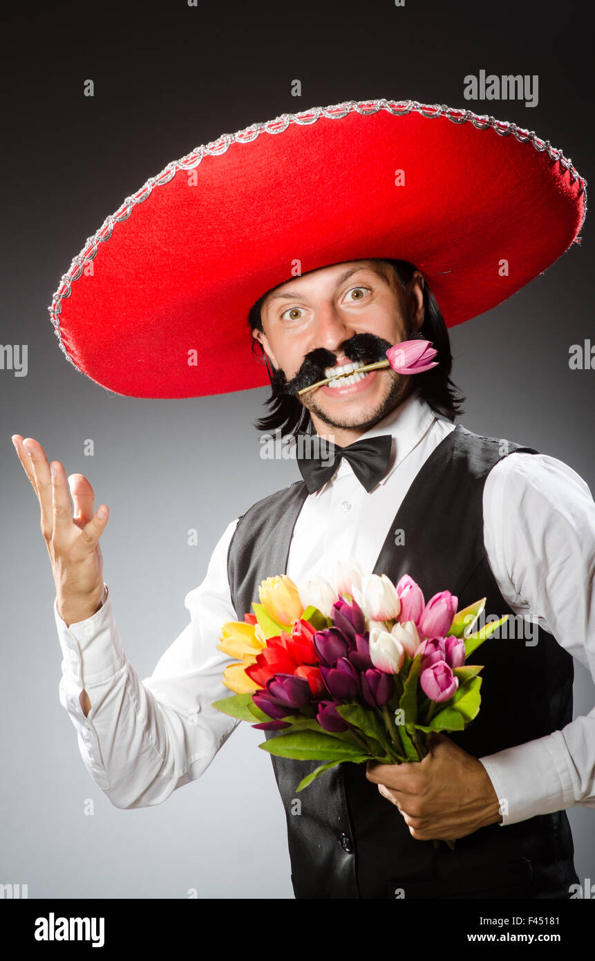 Mexican man wears sombrero isolated on white Stock Photo - Alamy