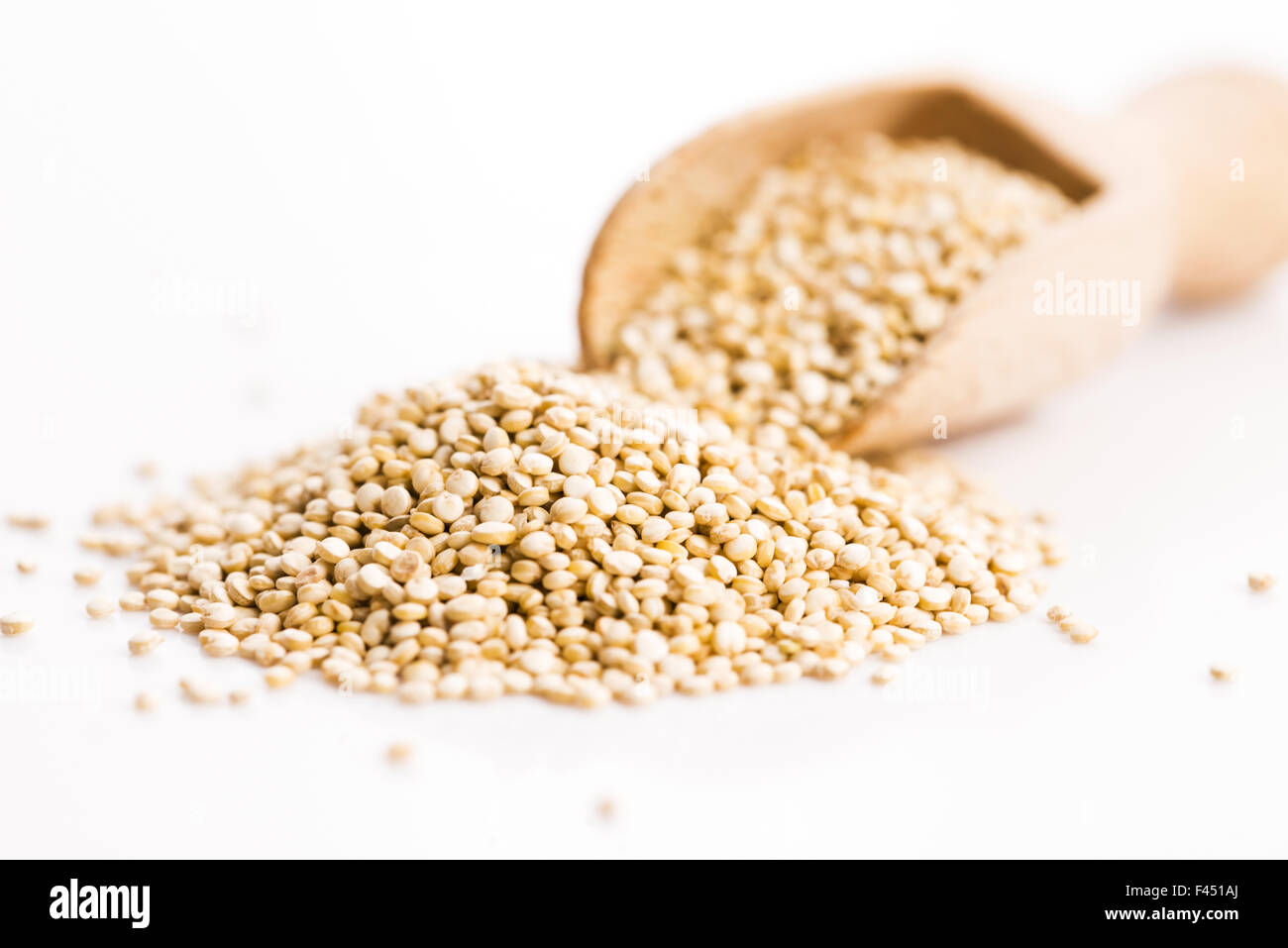 Pile of quinoa grain on a white background Stock Photo - Alamy