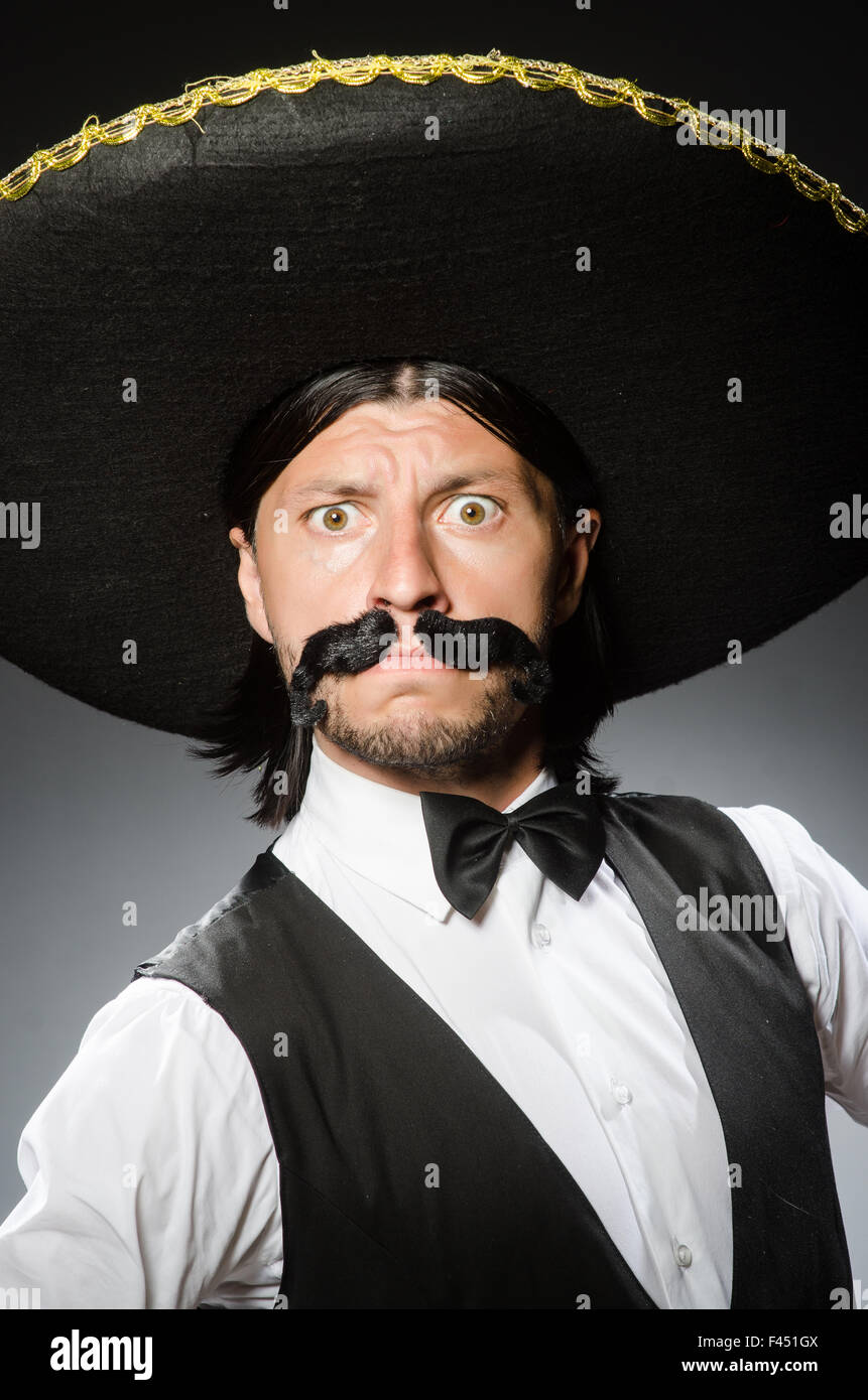 Mexican man wears sombrero isolated on white Stock Photo - Alamy