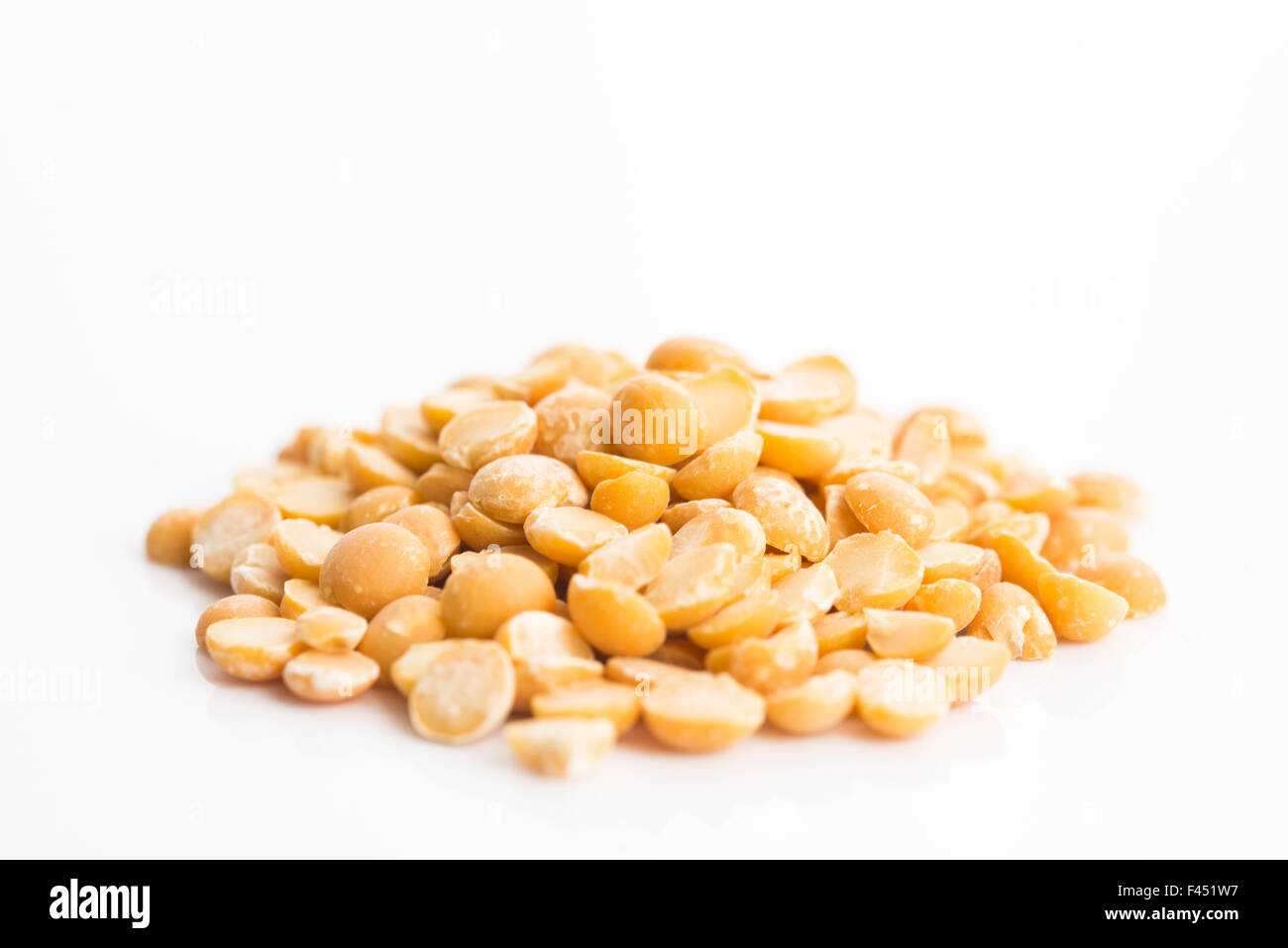 Yellow split peas isolated on white background Stock Photo - Alamy