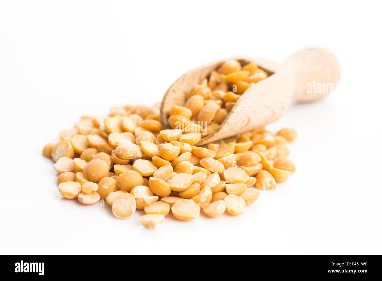 Yellow split peas isolated on white background Stock Photo - Alamy