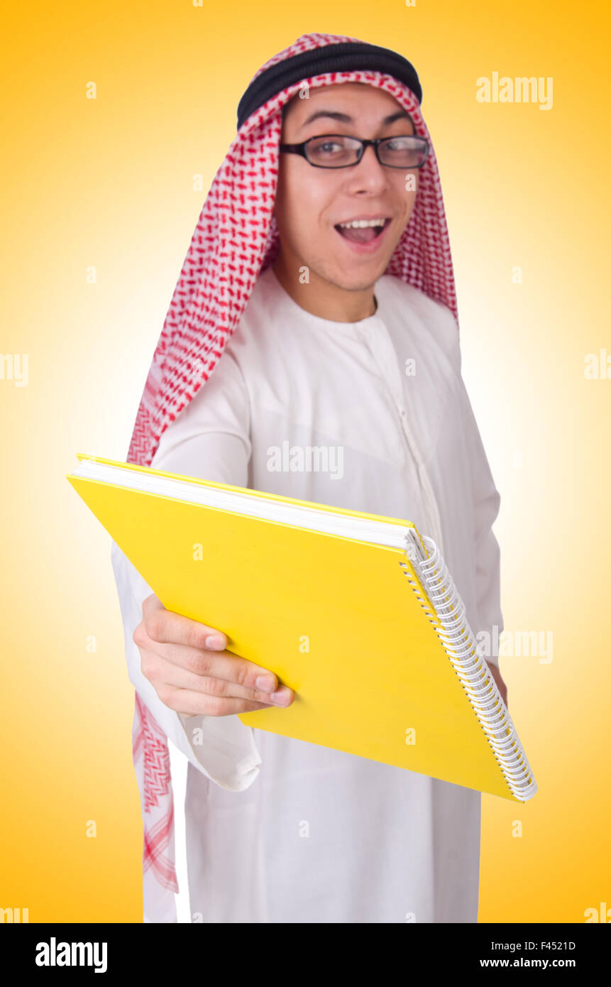Arab male student reading hi-res stock photography and images - Alamy