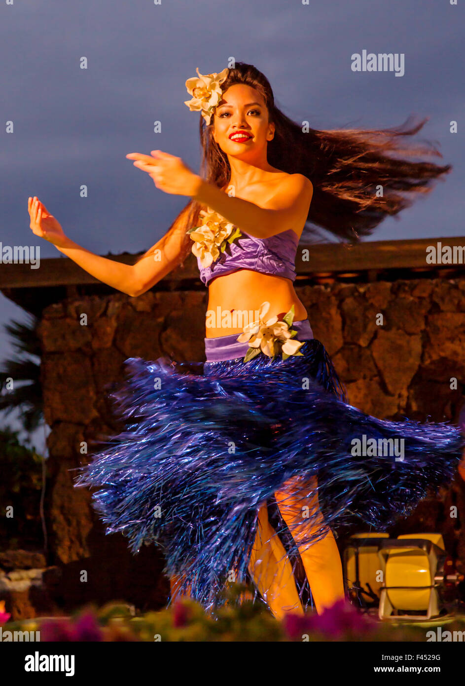 Beautiful young native woman performing traditional dance at Luau, Big ...