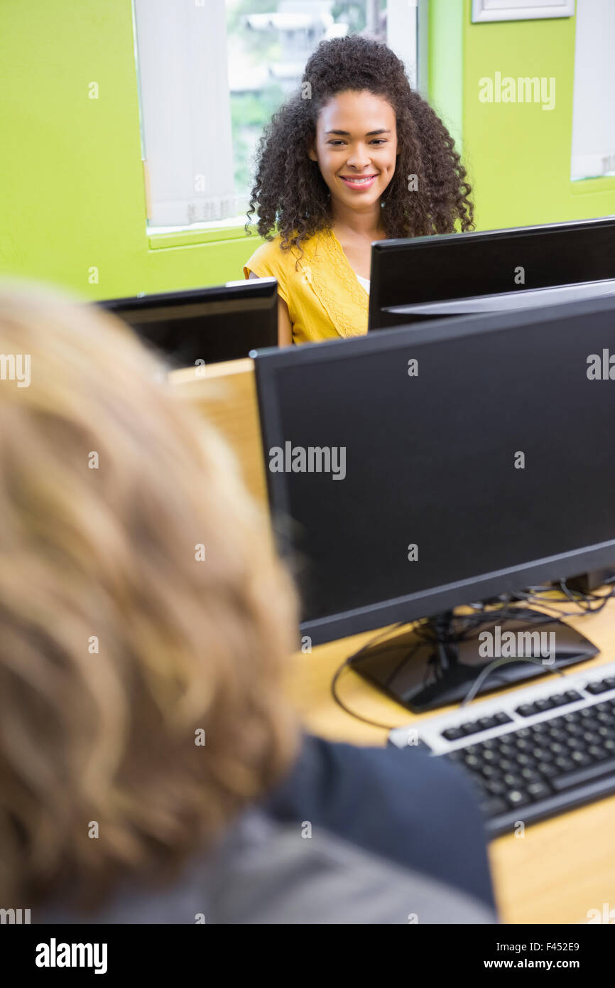 Student working on computer in classroom Stock Photo - Alamy