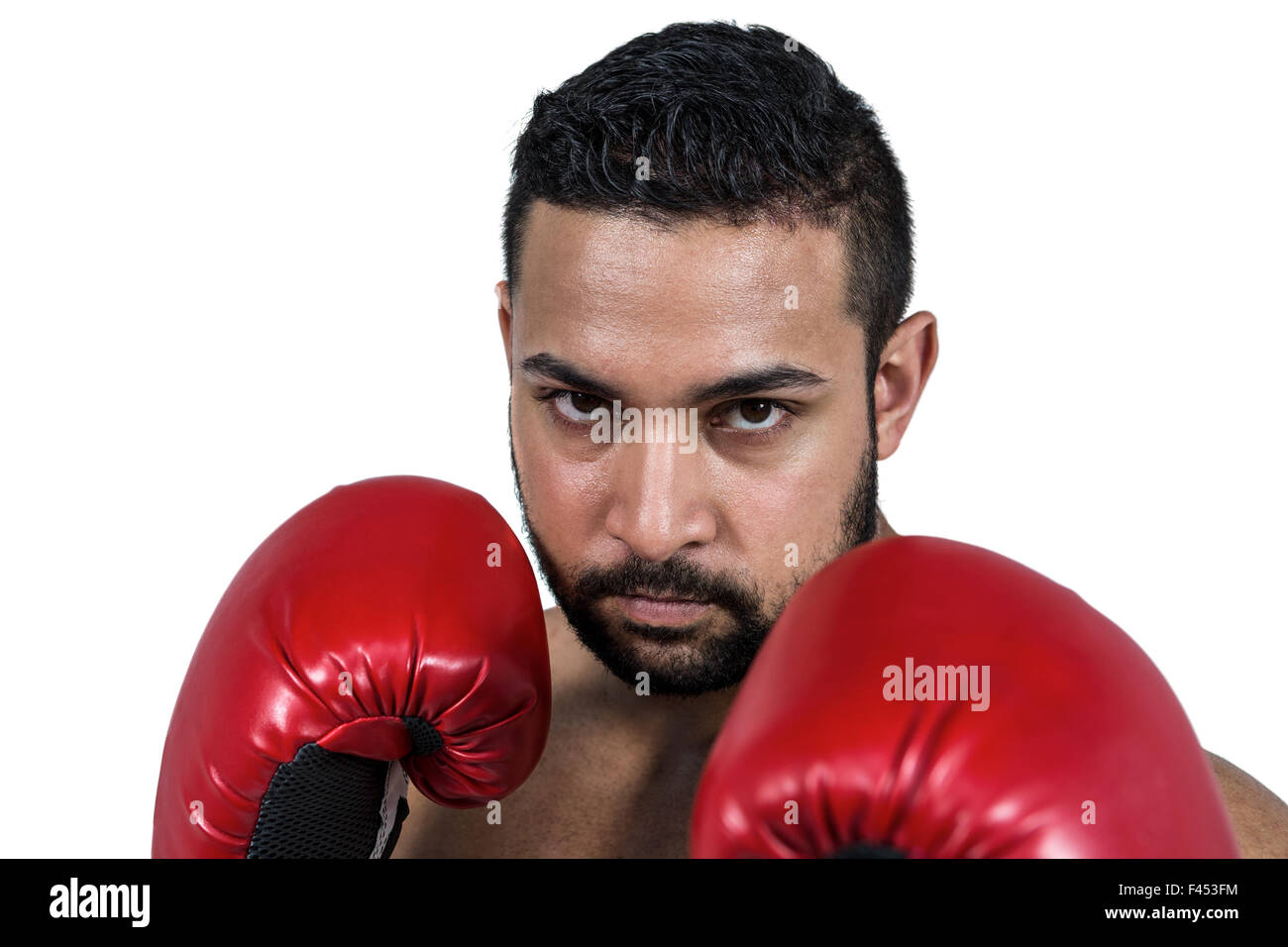 Muscular man boxing in gloves Stock Photo - Alamy