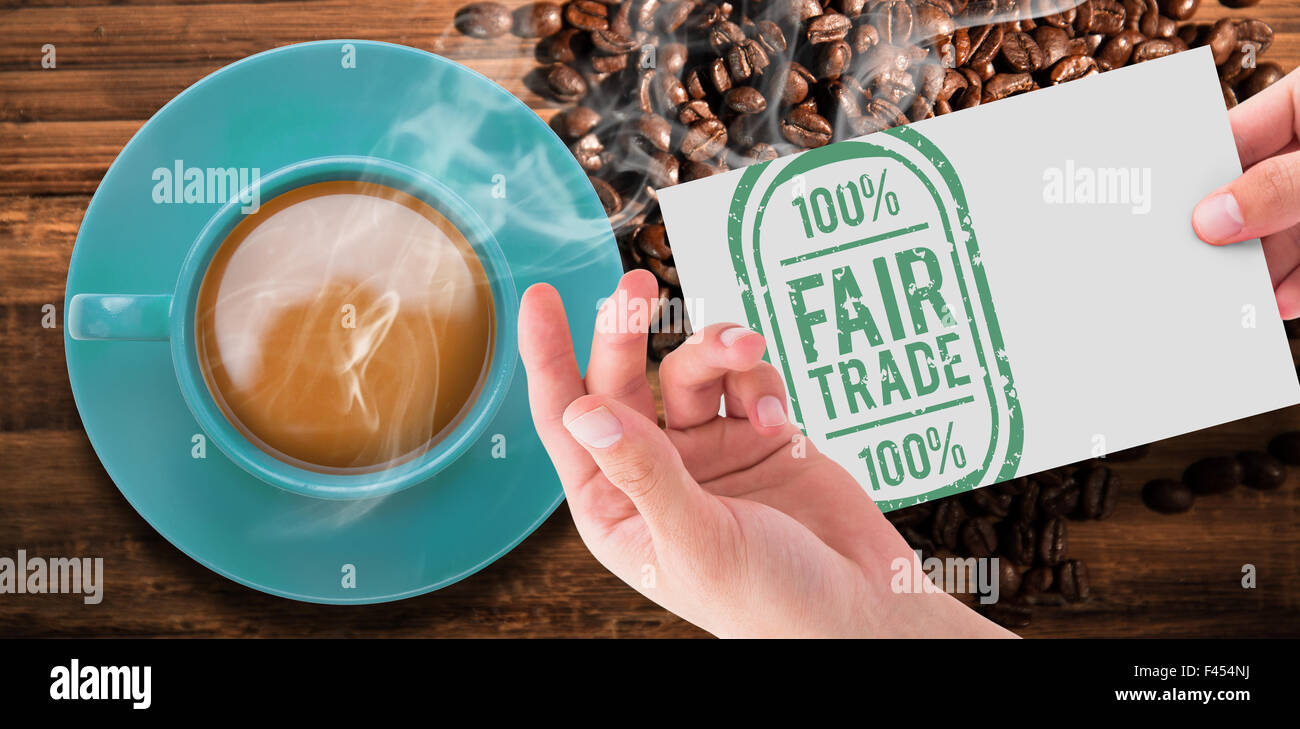 Composite image of hand showing card Stock Photo - Alamy