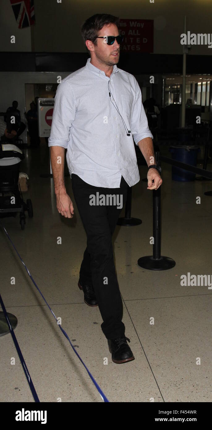 Armie Hammer arrives at Los Angeles International Airport (LAX) with ...