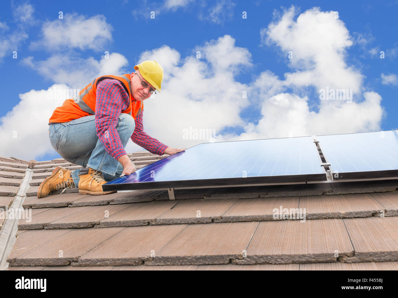 worker and solar panels Stock Photo - Alamy