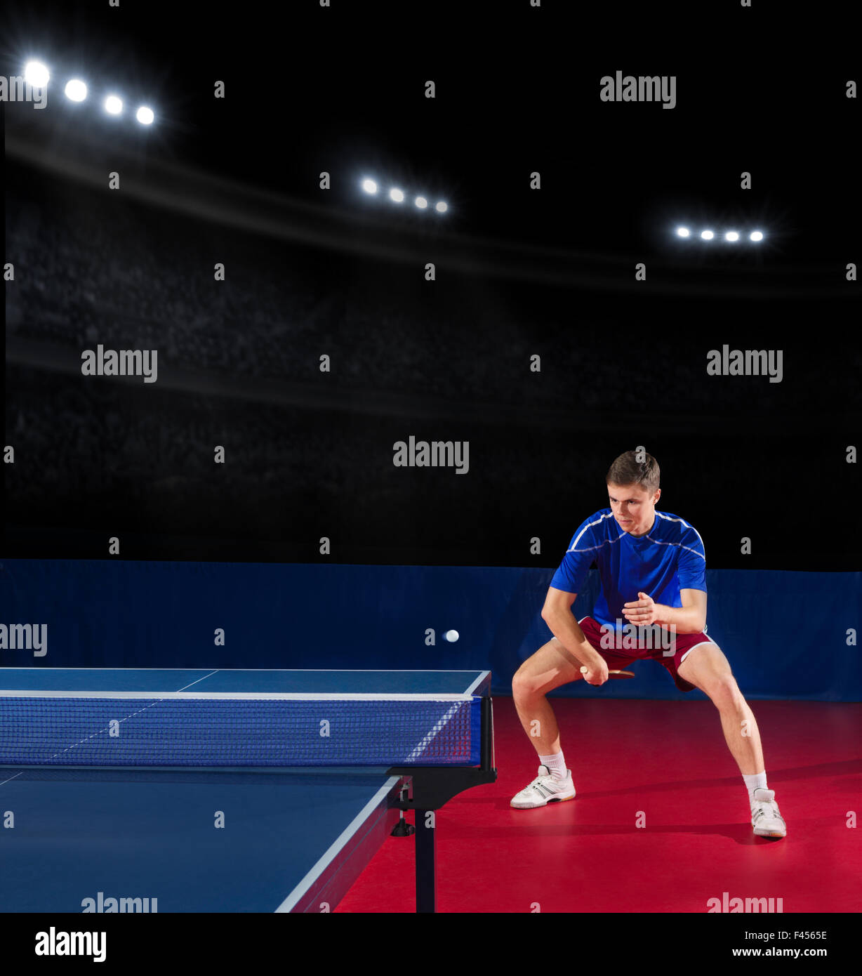 Table tennis player at sports hall Stock Photo - Alamy
