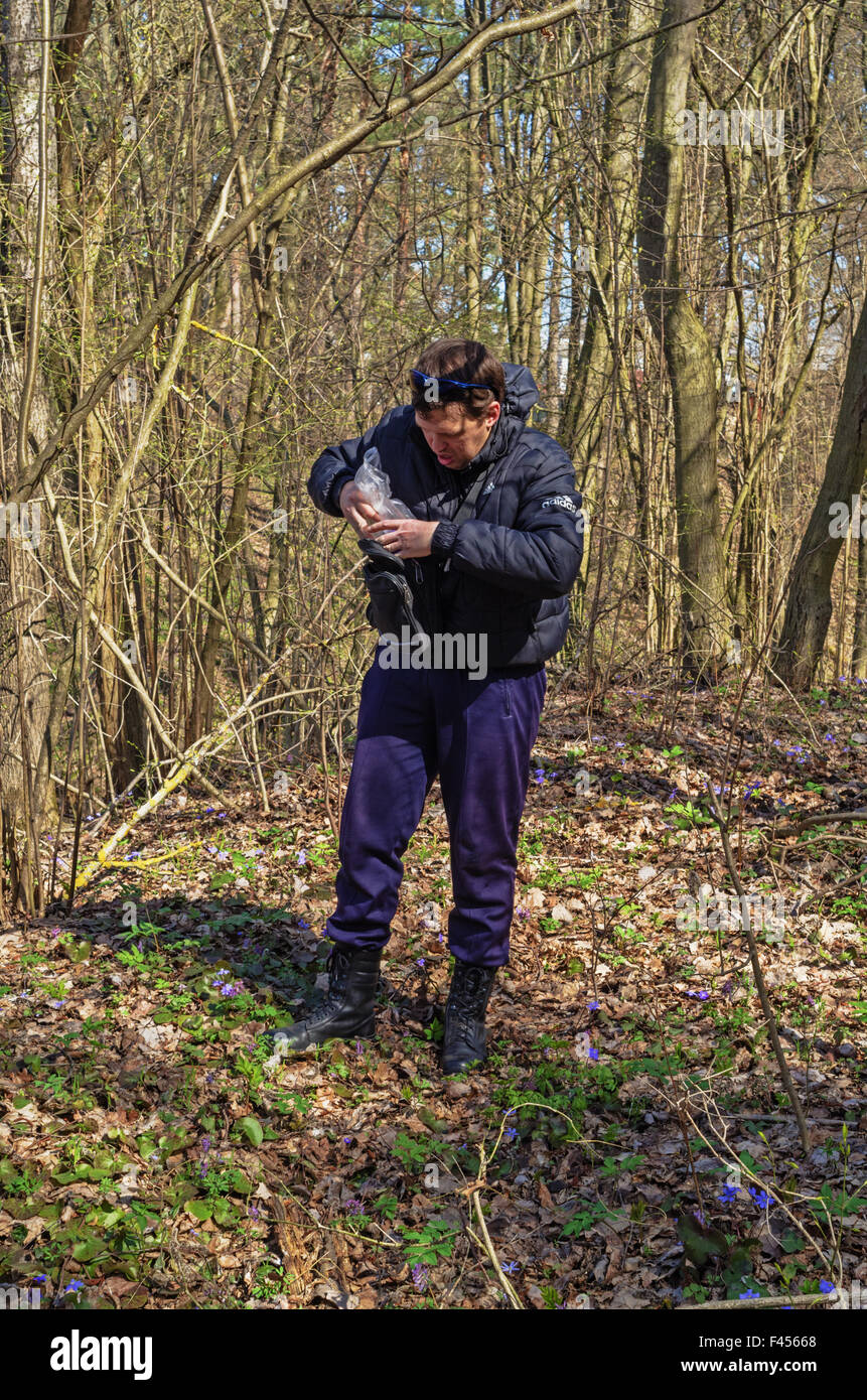 Man in spring forest Stock Photo - Alamy