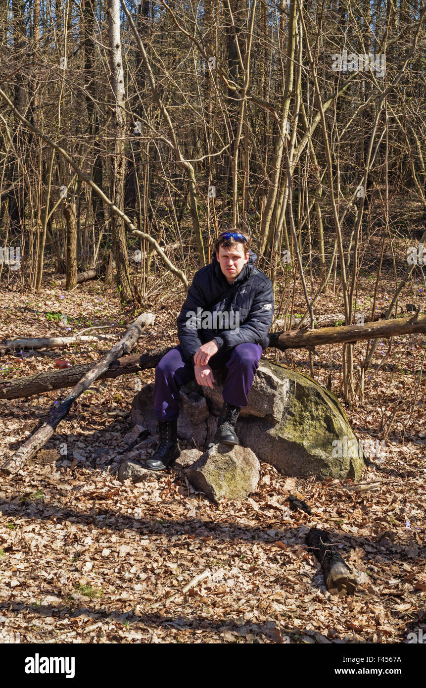 Man in spring forest Stock Photo - Alamy