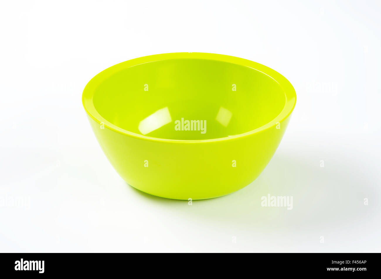 bright green bowl on white background Stock Photo - Alamy