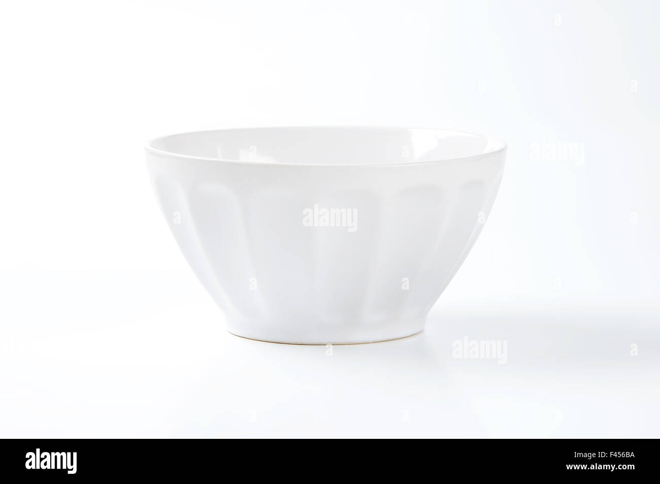 white decorative bowl on white background Stock Photo - Alamy