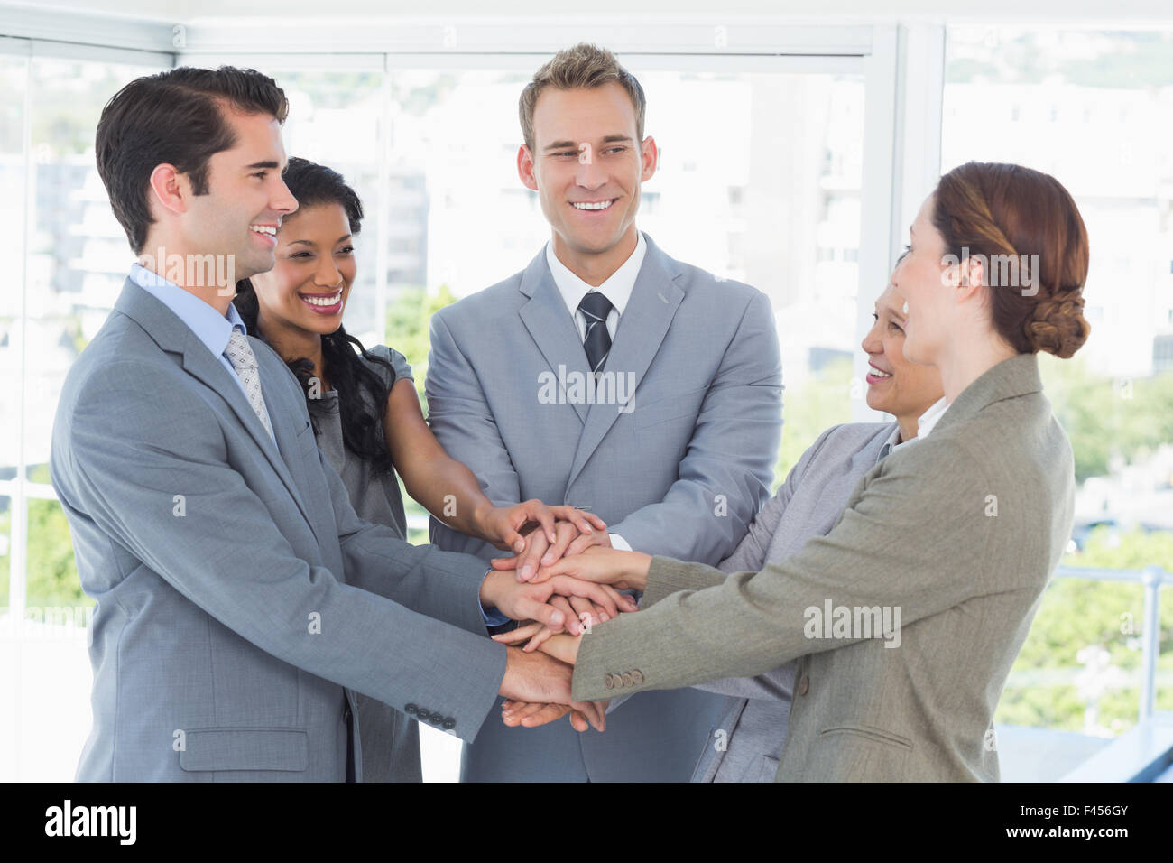 Business team celebrating good job hi-res stock photography and images ...