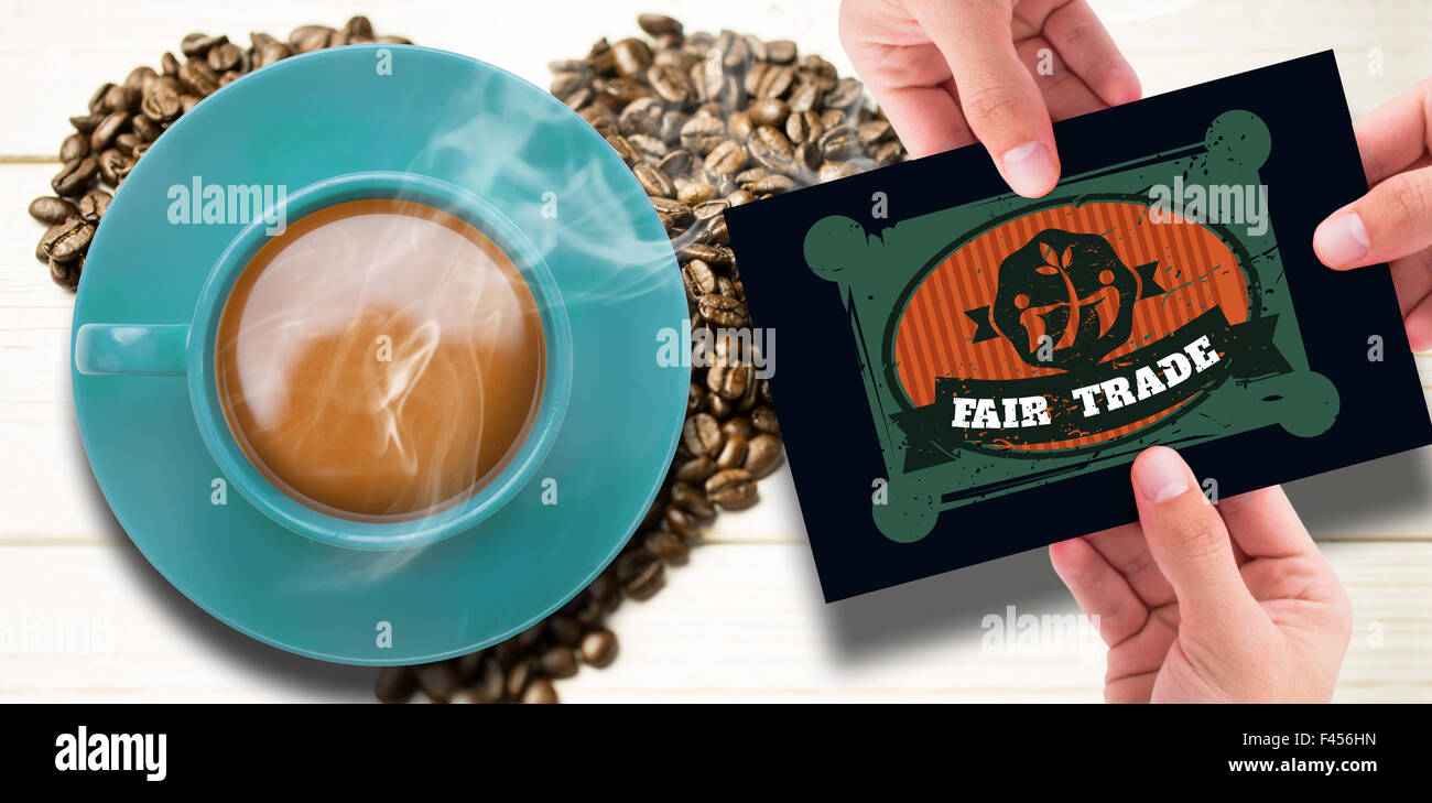 Composite image of hand showing card Stock Photo - Alamy