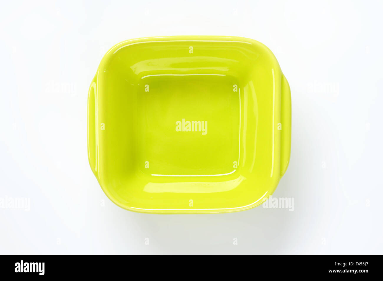 bright green baking tray on white background Stock Photo - Alamy