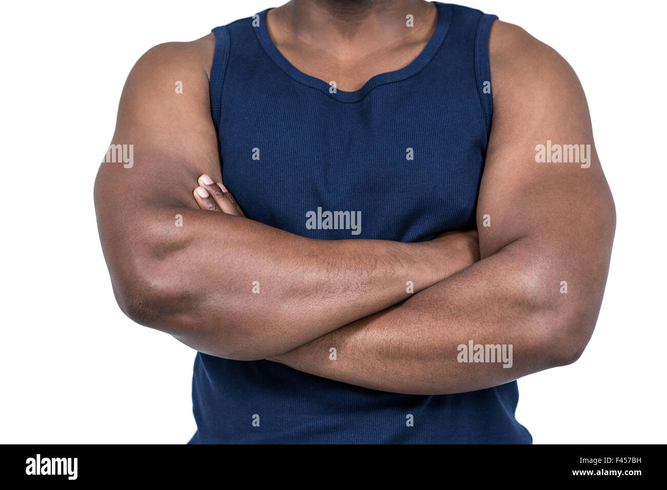 Fit man with arms crossed Stock Photo - Alamy
