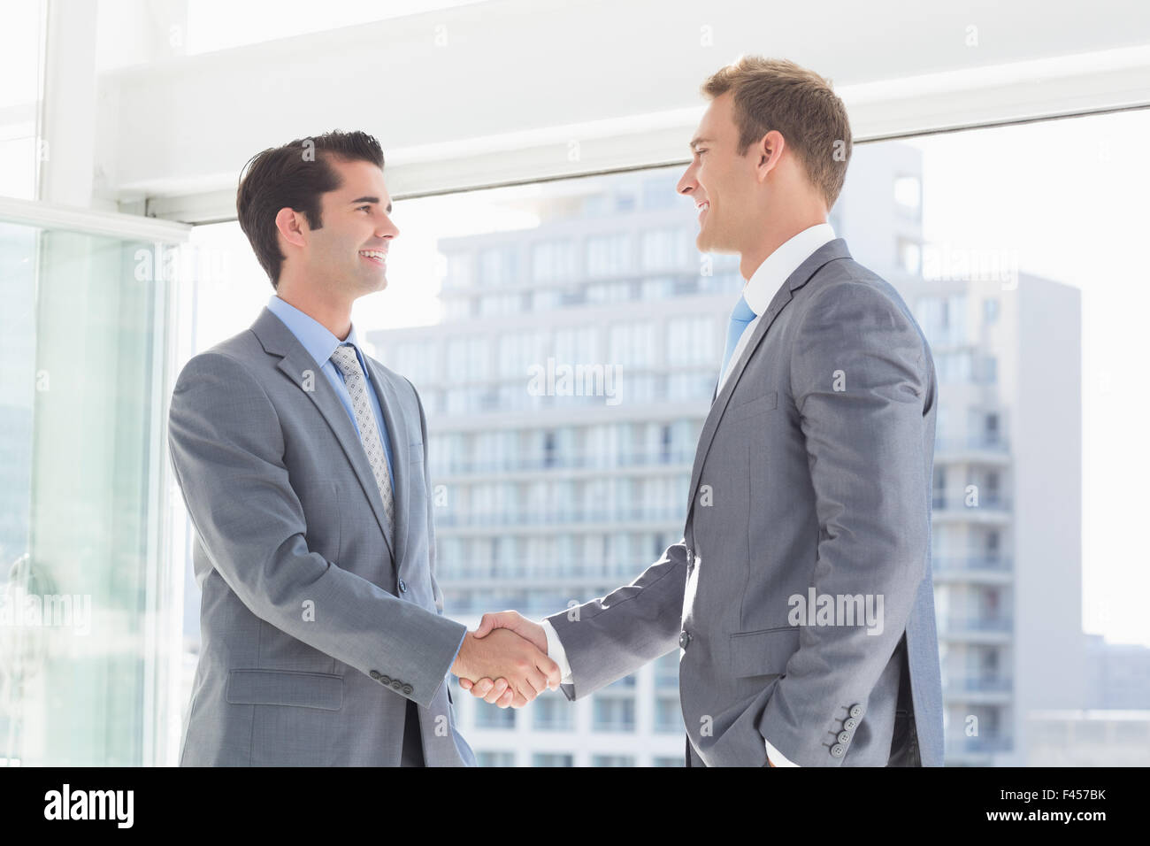 Greeting colleagues hi-res stock photography and images - Alamy