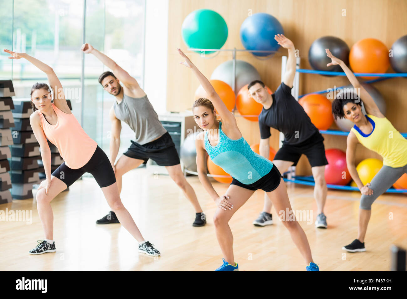 Fitness class exercising in the studio Stock Photo - Alamy