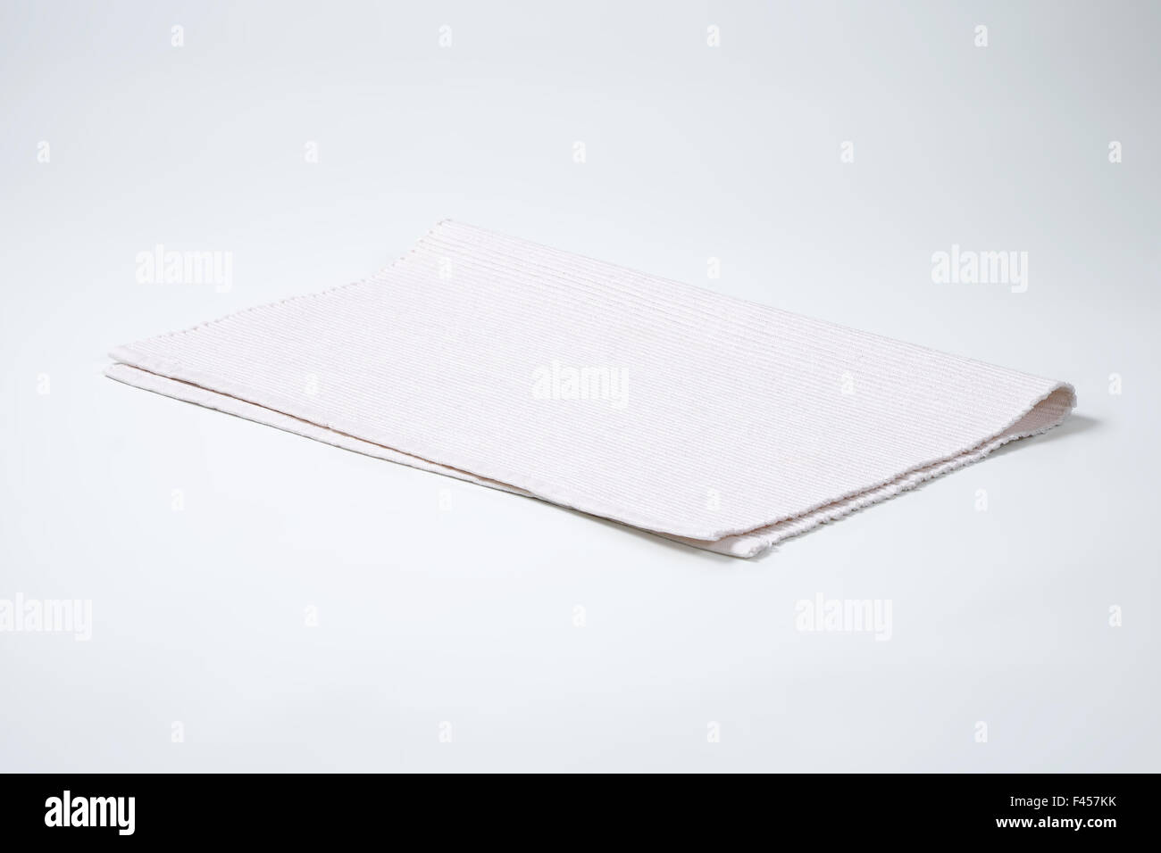 white place mat on white background Stock Photo - Alamy