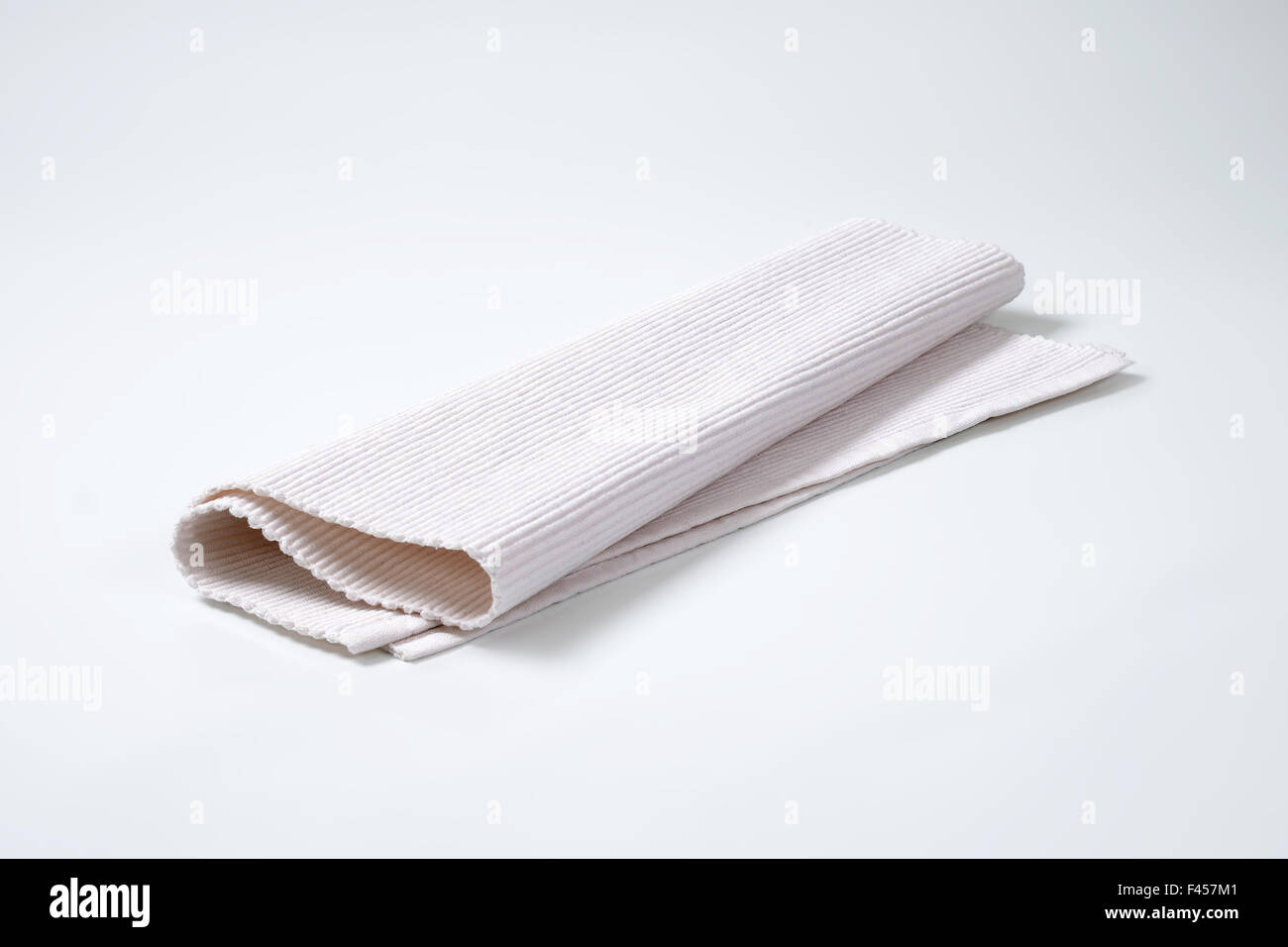 white place mat on white background Stock Photo - Alamy