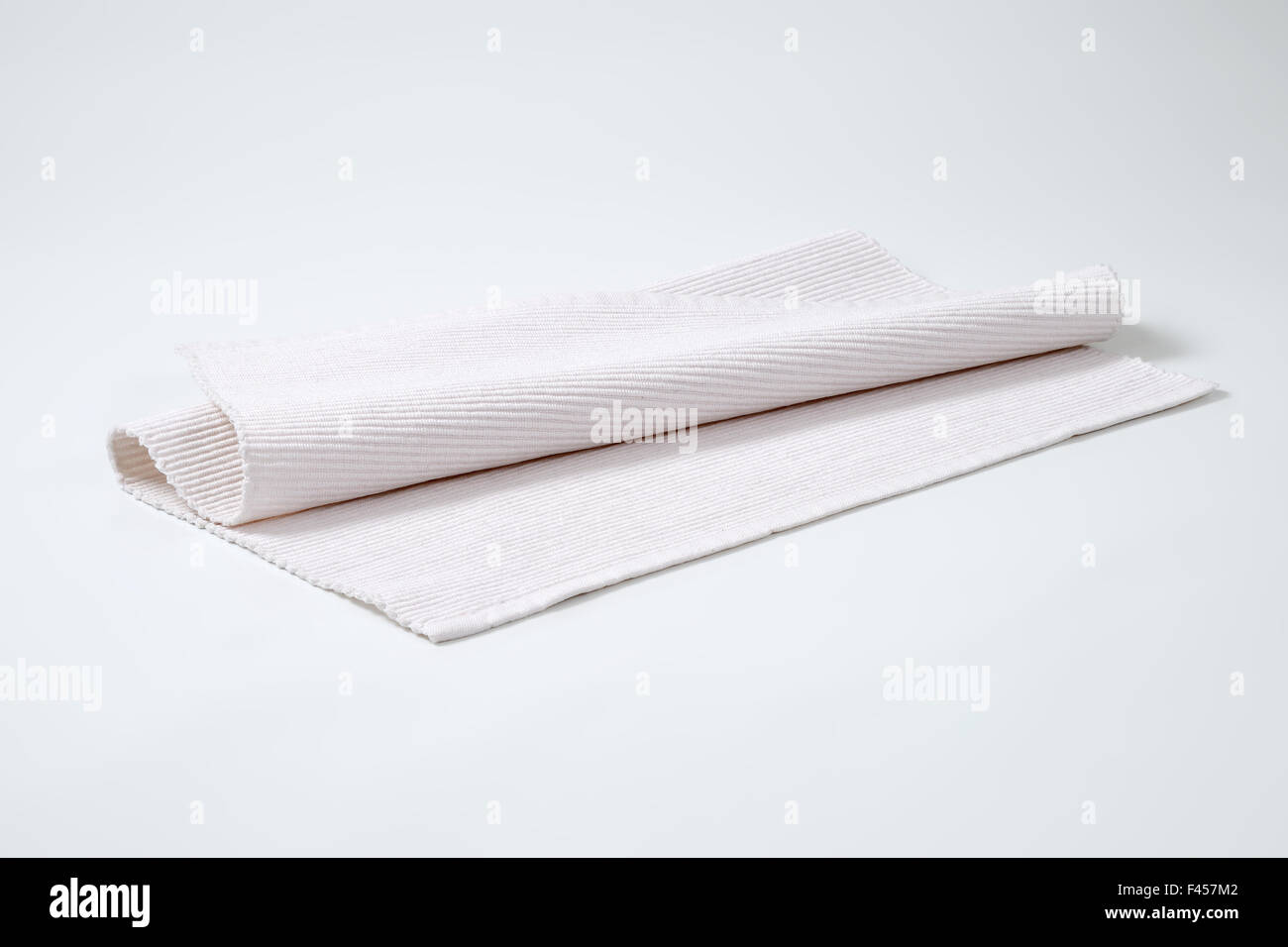 white place mat on white background Stock Photo - Alamy