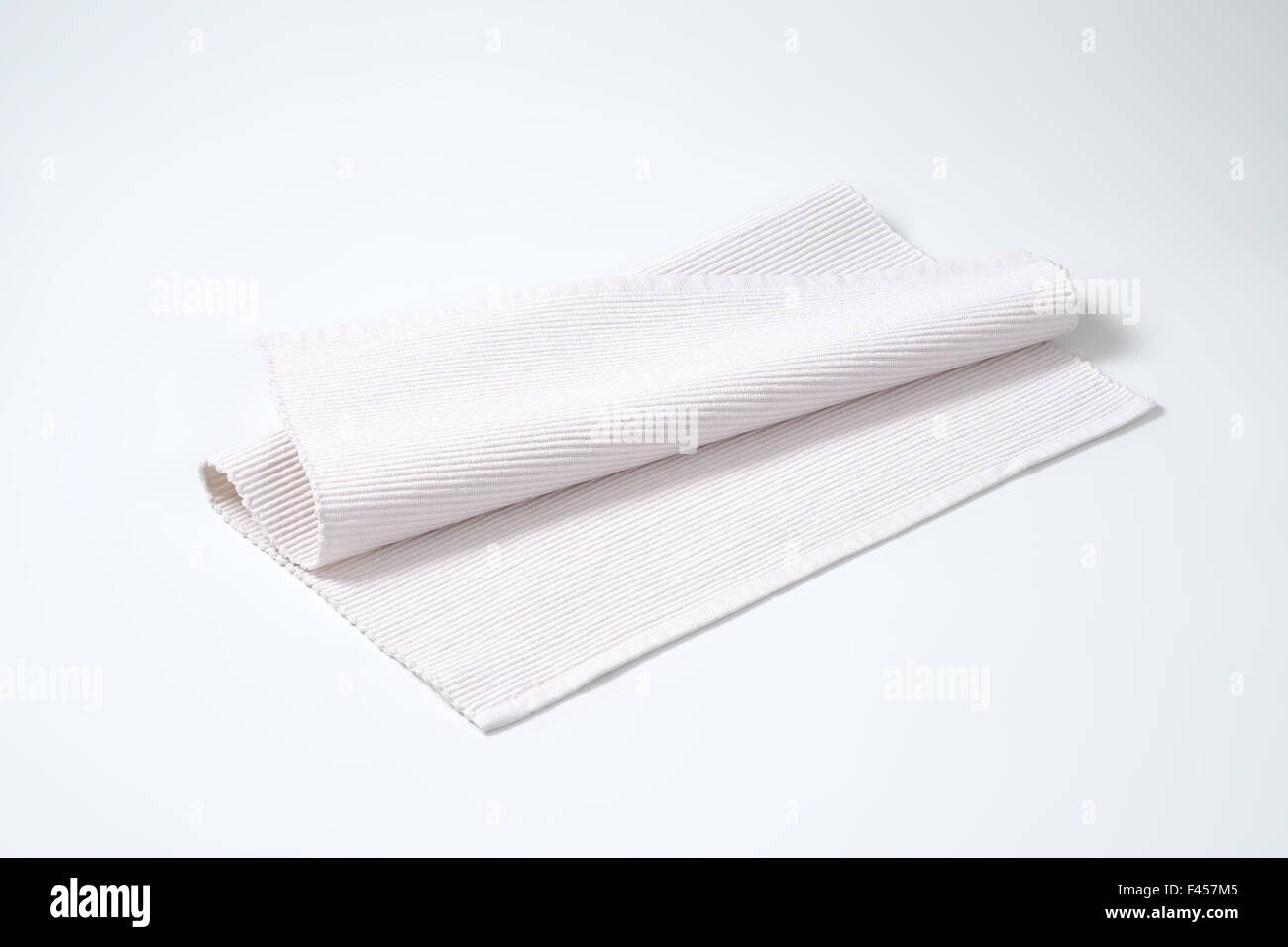 white place mat on white background Stock Photo - Alamy