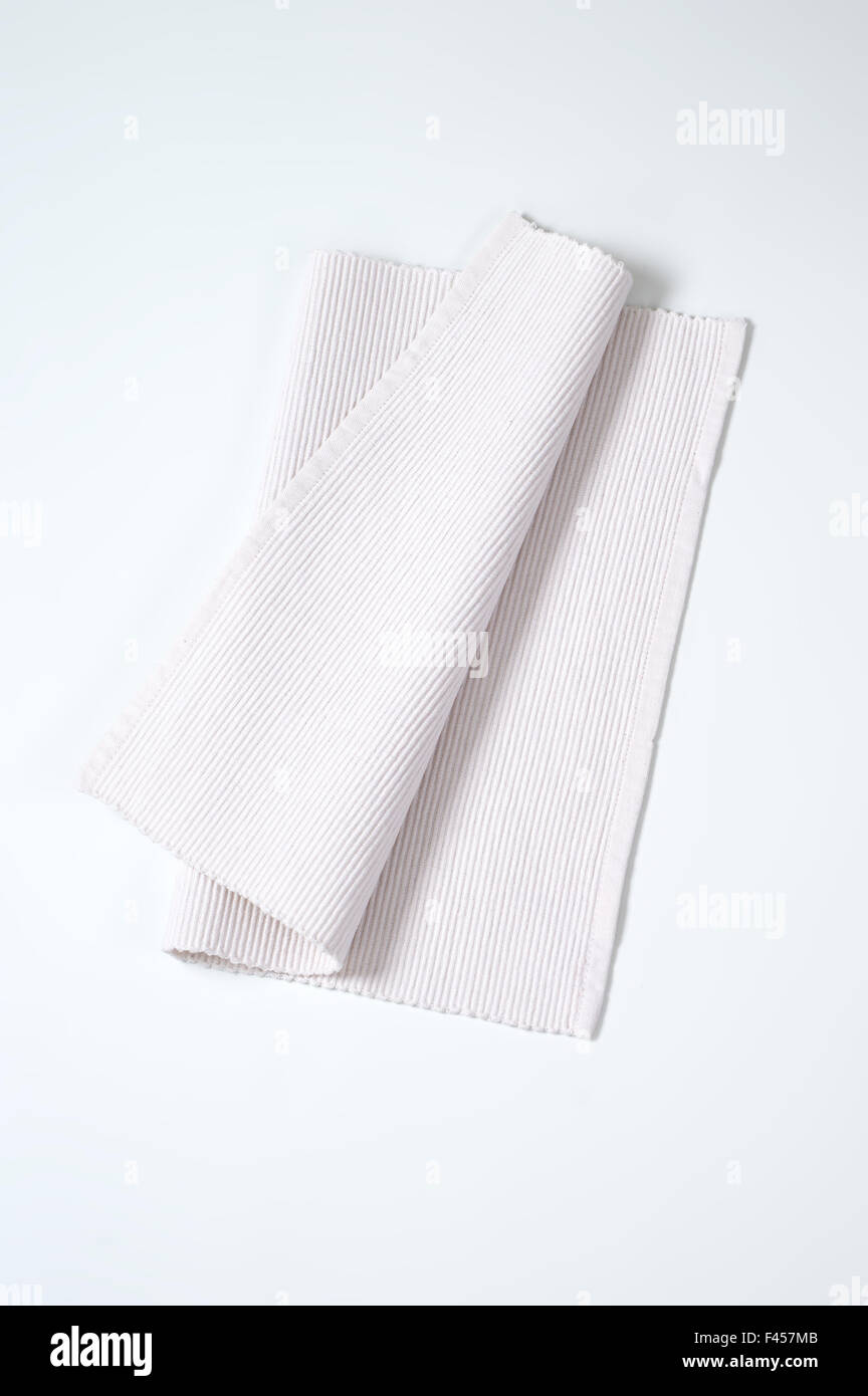 white place mat on white background Stock Photo - Alamy