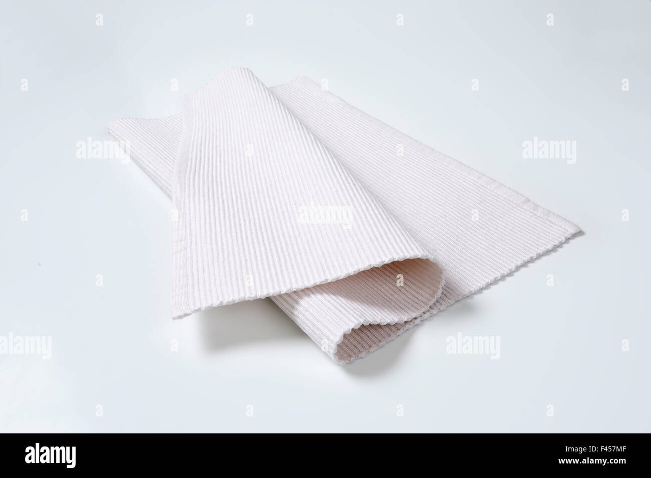 white place mat on white background Stock Photo - Alamy