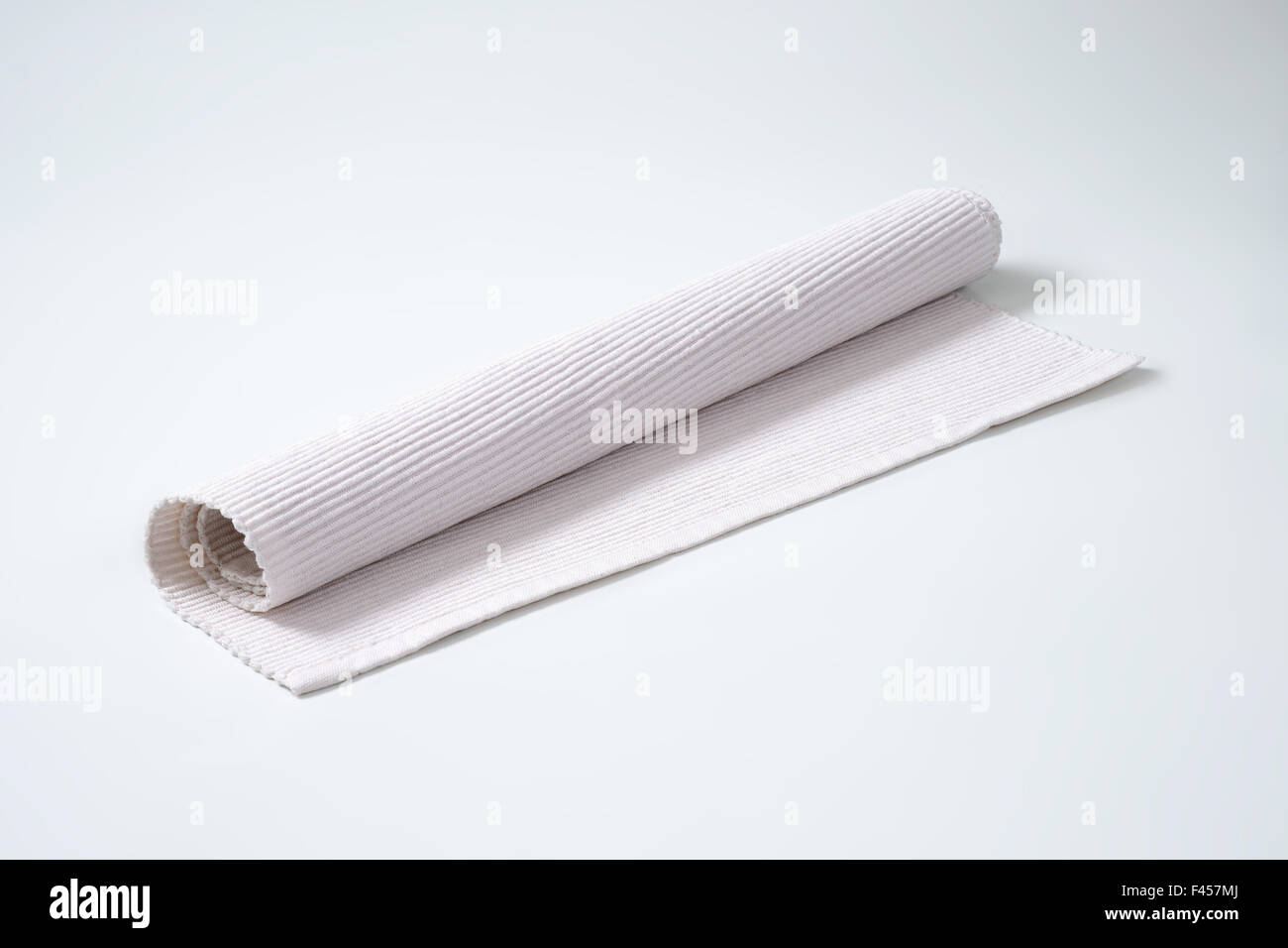 white place mat on white background Stock Photo - Alamy